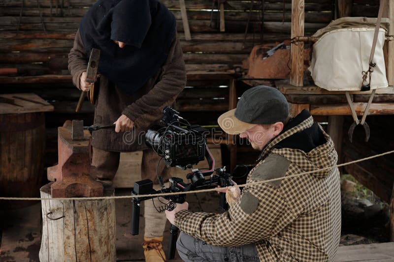 Filming Traditional Blacksmith Working in Workshop Stock Photo - Image ...