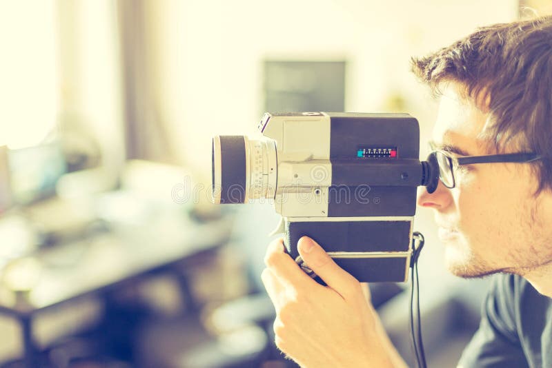 Filmmaker is Doing a Movie, Vintage Old Movie Camera Stock Photo ...