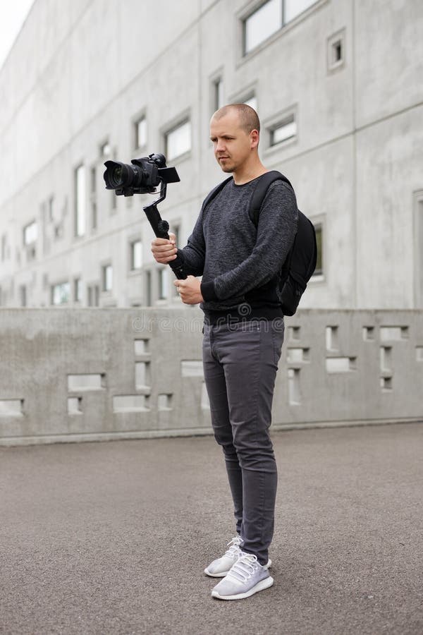 Filmmaking, Hobby and Creativity Concept - Professional Videographer ...