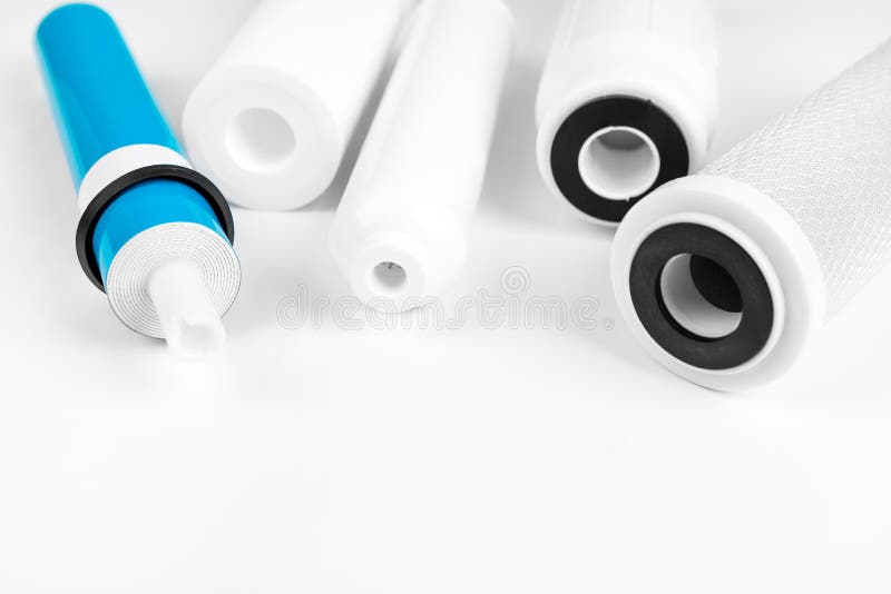 Filter Cartridges for Water on a Bright Blue Background. Stock Image ...