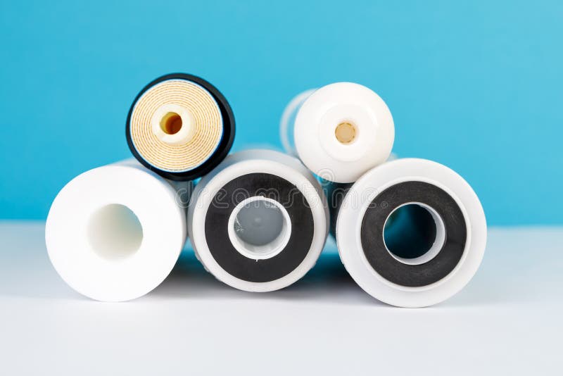 Filter Cartridges for Water on a Bright Blue Background. Stock Image ...
