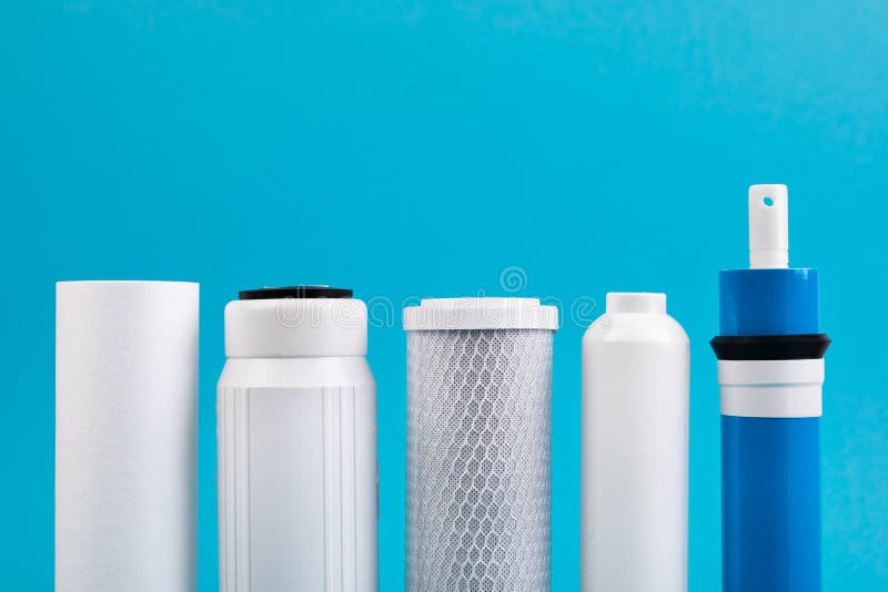 Filter Cartridges for Water on a Bright Blue Background. Stock Image ...
