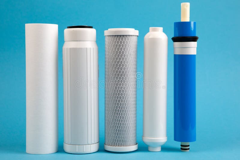 Filter Cartridges for Water on a Bright Blue Background. Stock Image ...