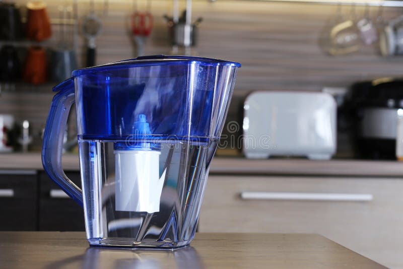 Filter for Cleaning Drinking Water on the Table in the Kitchen ...