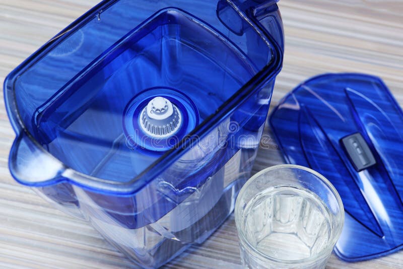 Filter for Cleaning Drinking Water on the Table in the Kitchen ...