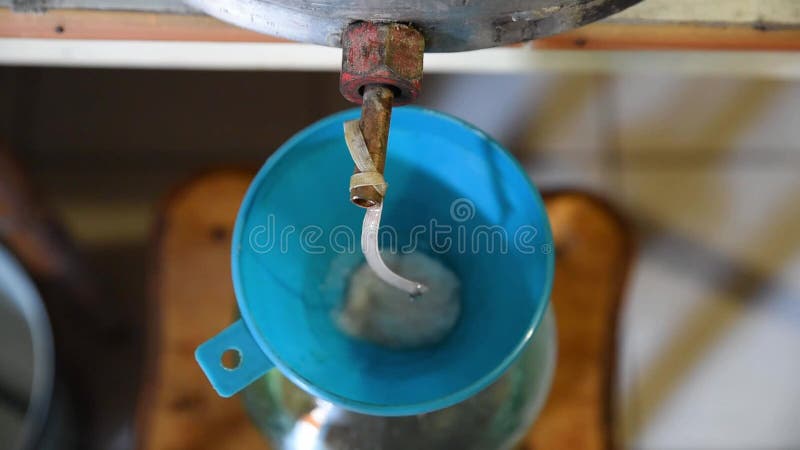 Filtering a Vodka Using Cotton and Getting the Finished Product in a ...