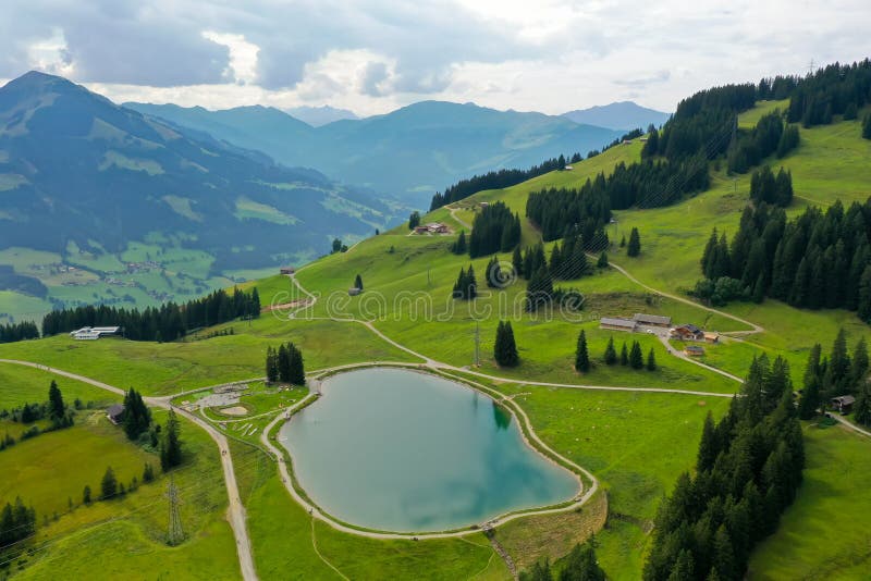 Filzalmsee stock image. Image of drone, mountains, lake - 228527561
