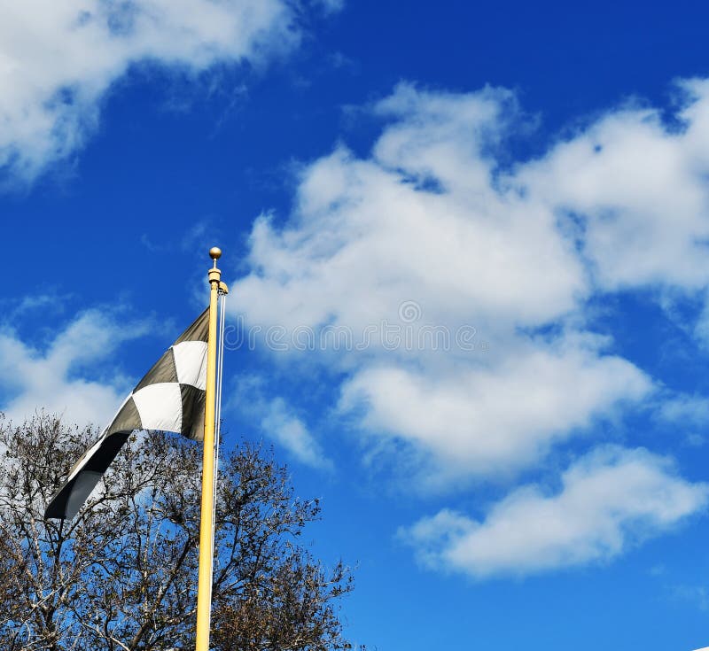 Final lap flag and clouds stock photo. Image of race - 144540230