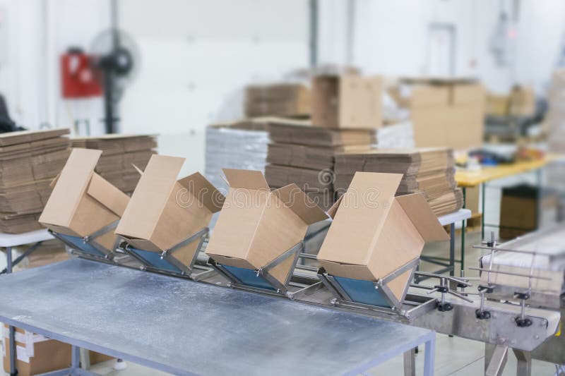 Empty Boxes at Factory Packing Line Stock Photo - Image of room ...
