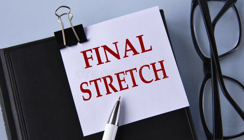 FINAL STRETCH - Words on a White Piece of Paper on a Black Notebook ...