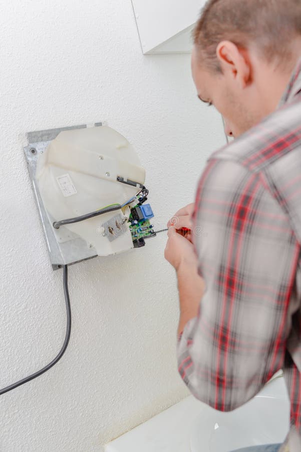 Finally fixing hand dryer stock image. Image of professional - 84629923