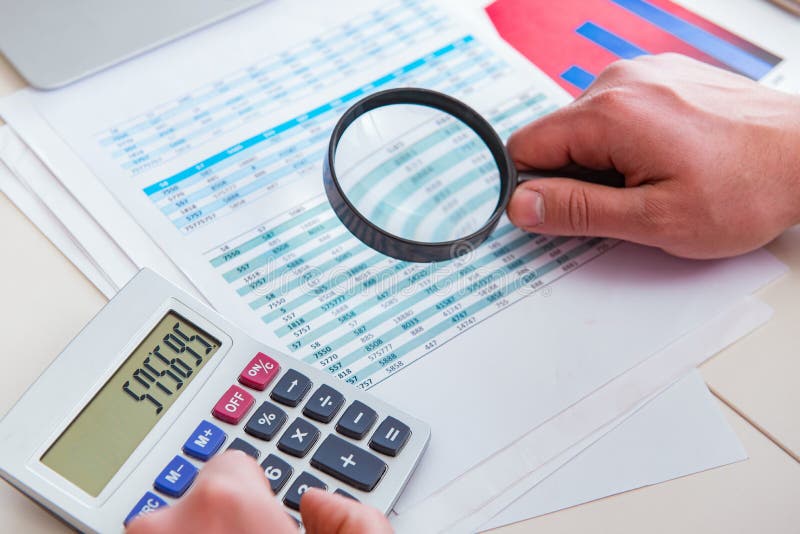 The Finance Analyst Looking and Financial Reports Stock Photo - Image ...