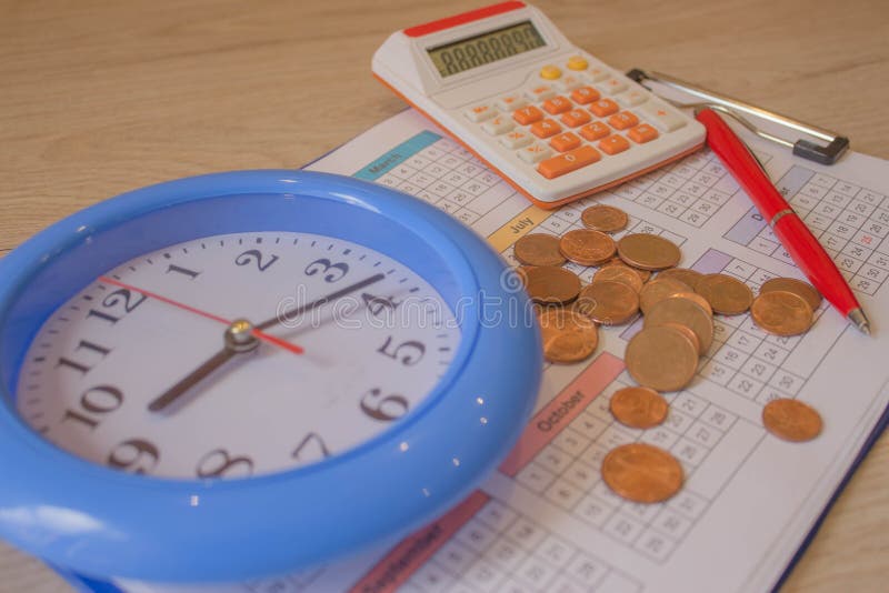 Finance Business Calculation. Coin Stack with a Clock Background Stock ...