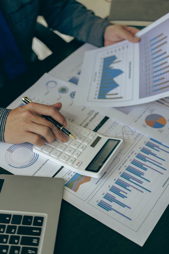 Finance and Calculations on the Table about Expenses at the Office ...