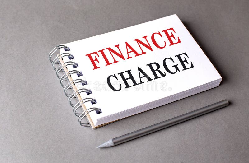 FINANCE CHARGE Text on Notebook on Grey Background Stock Photo - Image ...