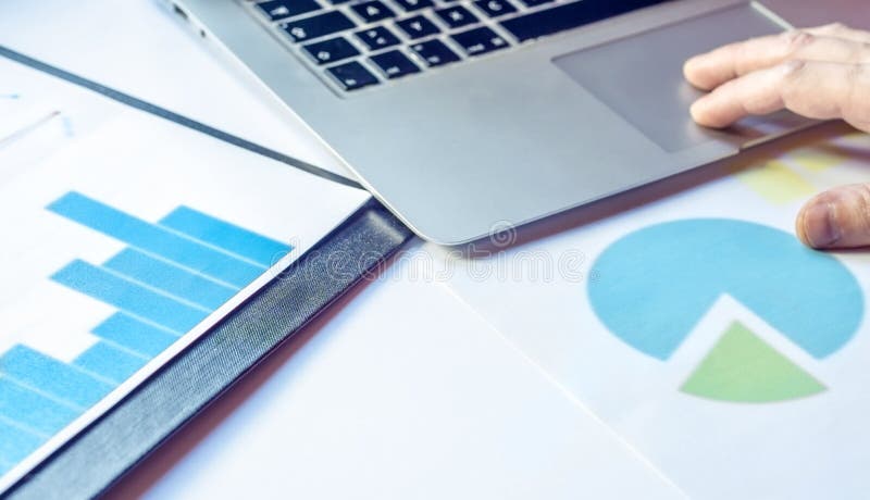 Finance Desk Charts and Laptop Stock Image - Image of investment, list ...