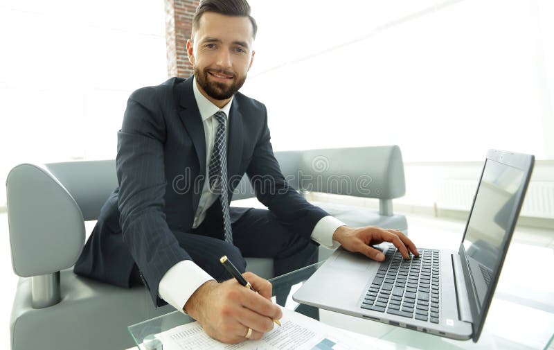 Finance Manager Working with Business Graphics on a Laptop Stock Photo ...