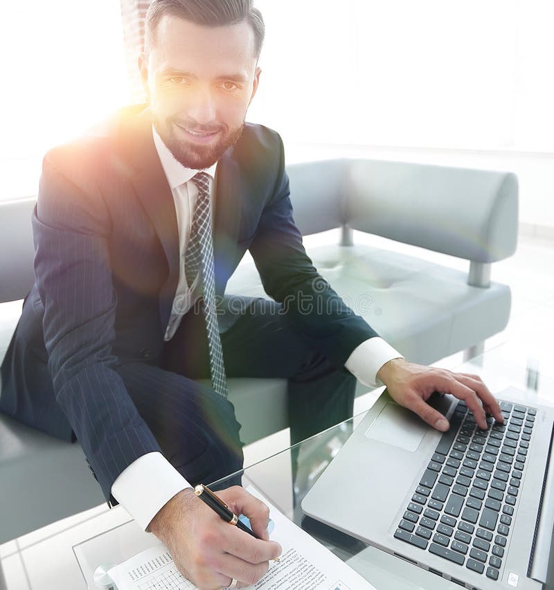 Finance Manager Working with Business Graphics on a Laptop Stock Image ...