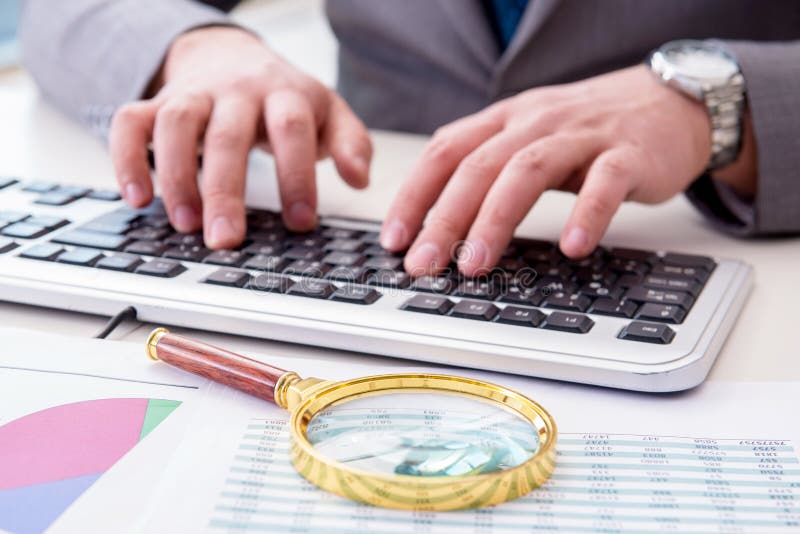 The Finance Professional Working on Keyboard with Reports Stock Image ...