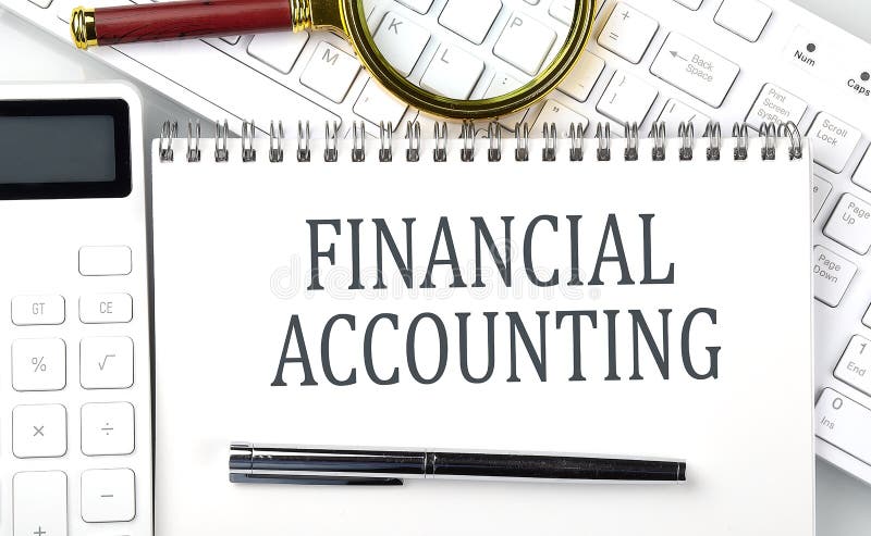 FINANCIAL ACCOUNTING Text on Notepad with Calculator and Keyboard ...