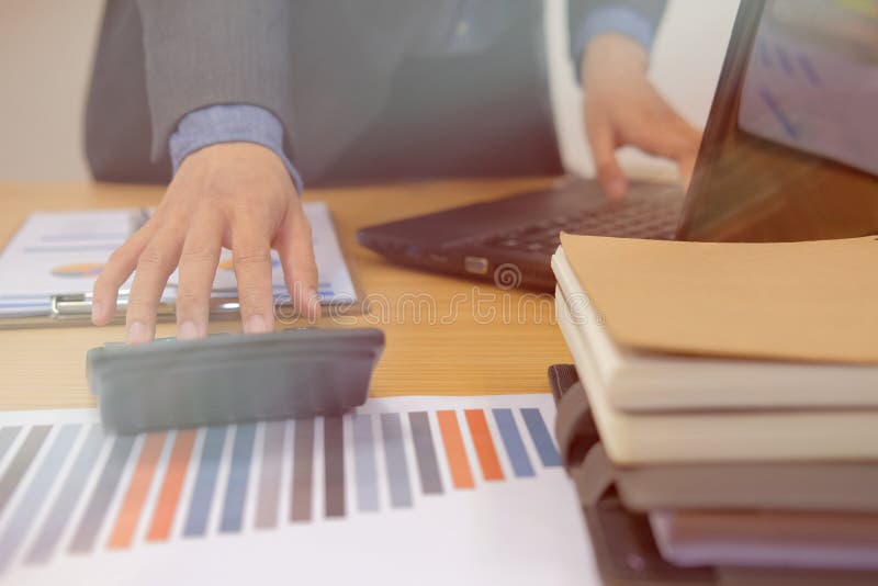 Financial Adviser Working with Calculator & Computer. Accountant Stock ...