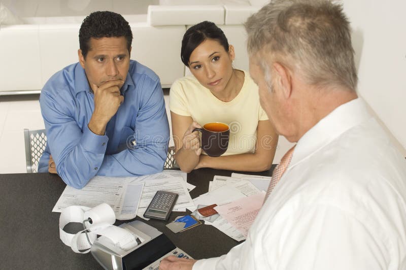 Financial Advisor in Discussion with Clients Stock Image - Image of ...