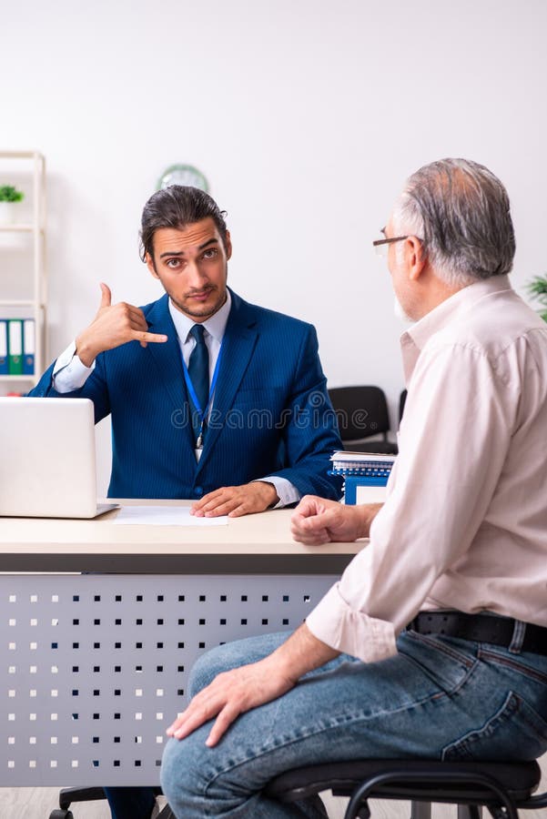 Financial Advisor Giving Retirement Advice To Old Man Stock Photo ...