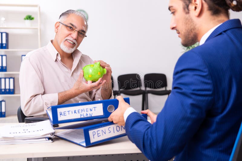Financial Advisor Giving Retirement Advice To Old Man Stock Photo ...