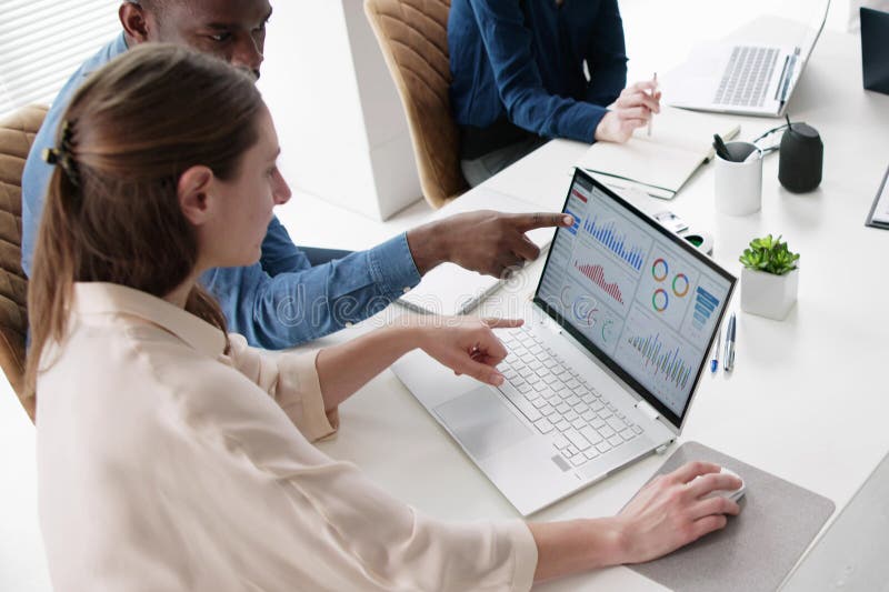 Financial Advisor Group Meeting Examining Stock Image - Image of ...