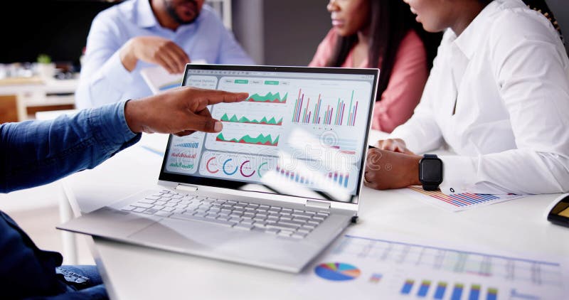 Financial Advisor Group Meeting Examining Analytics Stock Photo - Image ...