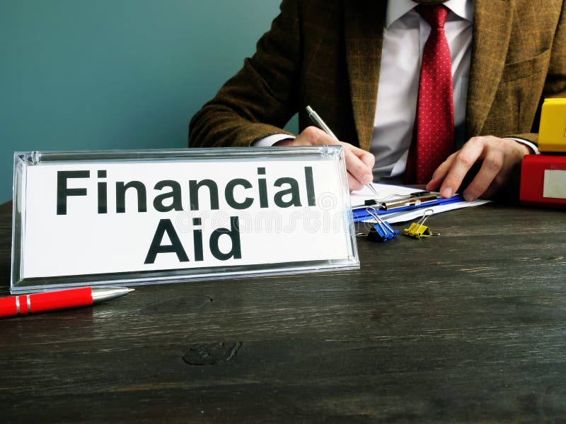 Financial Aid Phrase on the Plate in the Office Stock Photo - Image of ...
