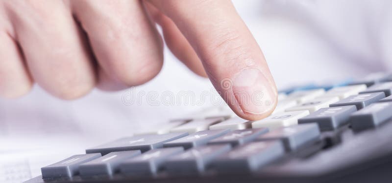 Financial Analysis Concept, Male Hands Using a Calculator Over ...