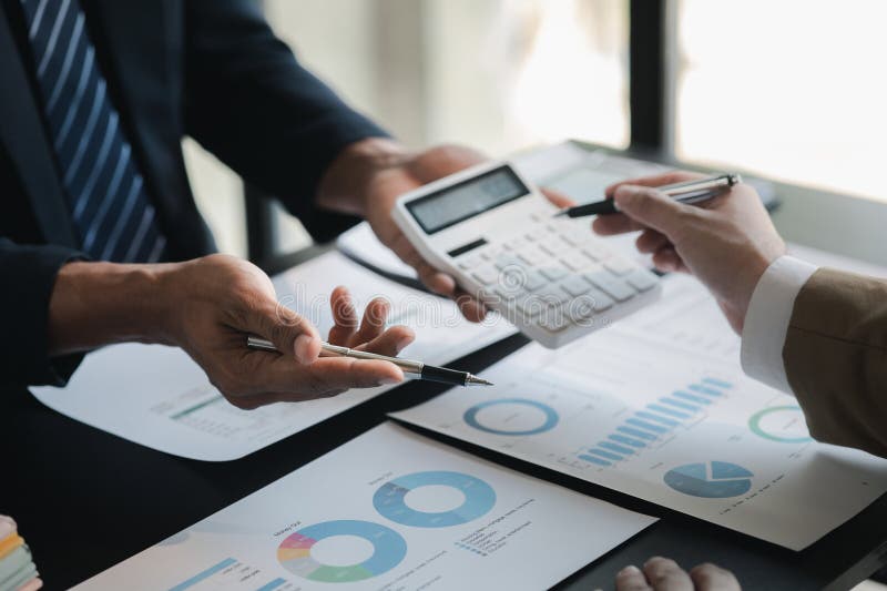 Financial Business Plan Meeting Take Notes in a Notebook with a Pen ...