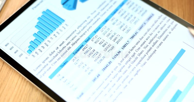 Financial Chart with Numbers and Analytics on Working Tablet Stock ...