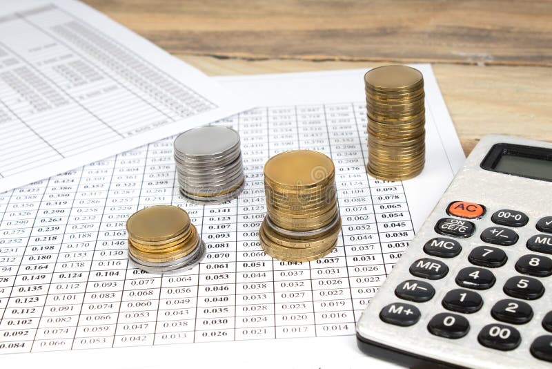 Financial Charts, Graphs, One, Calculator on a Wooden Table. Stock ...