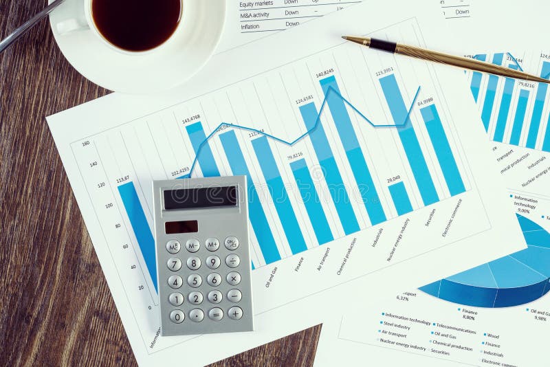 Financial Charts and Graphs on the Table Stock Photo - Image of ...