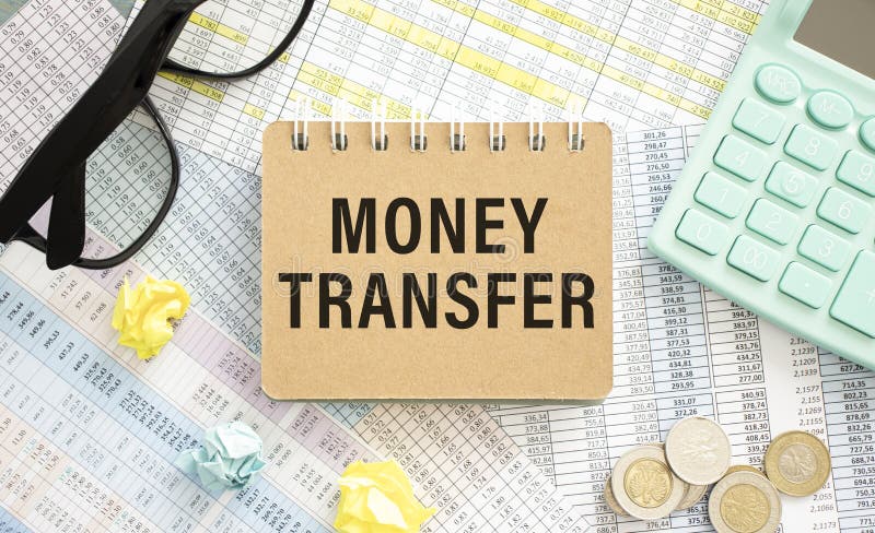 Financial Charts and Money is a Sign with the Text - MONEY TRANSFER ...
