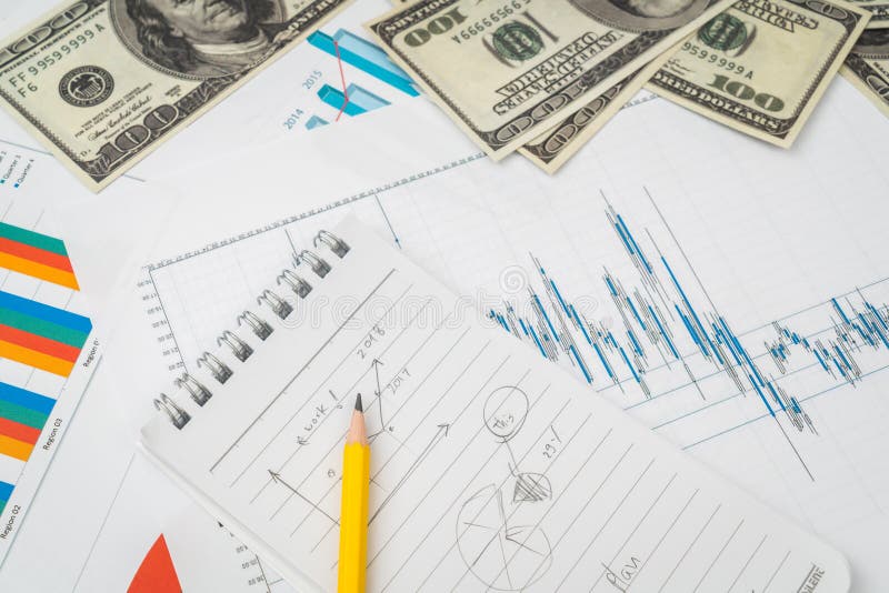 Financial Charts on the Table with Dollars Banknotes . Stock Image ...
