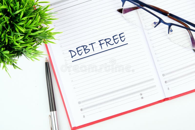 Financial Concept. DEBT FREE Word in a Business Notebook, a Note on a ...