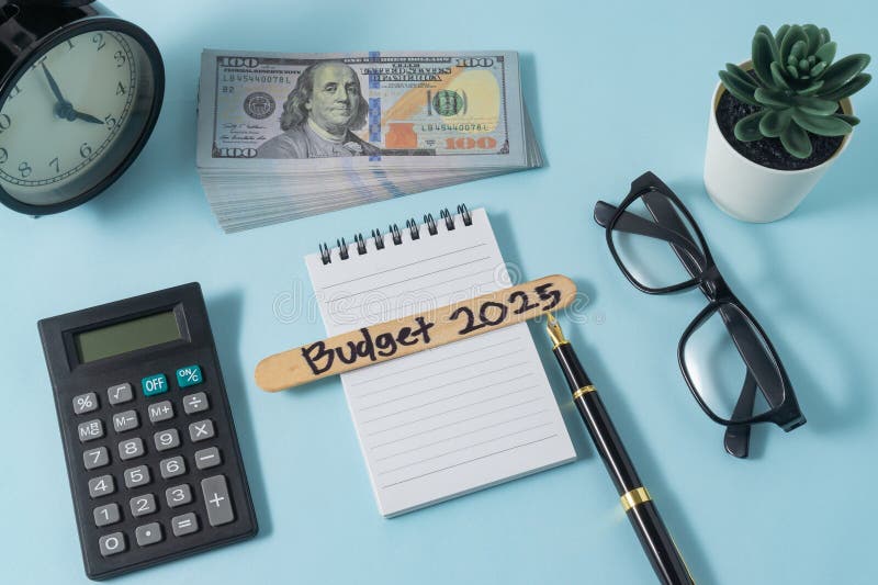 Financial Concept with a Hand Writing Budget 2025 on Ice Cream Stick ...