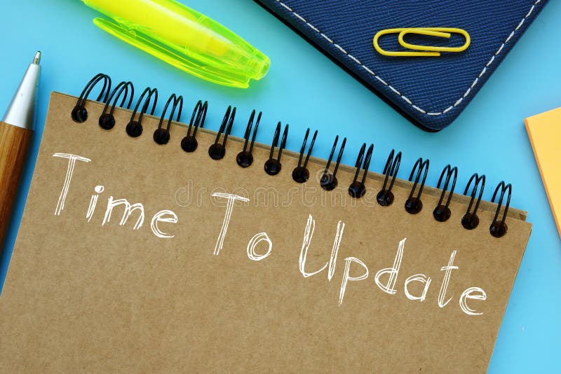 Financial Concept Meaning Time To Update with Sign on the Sheet Stock ...