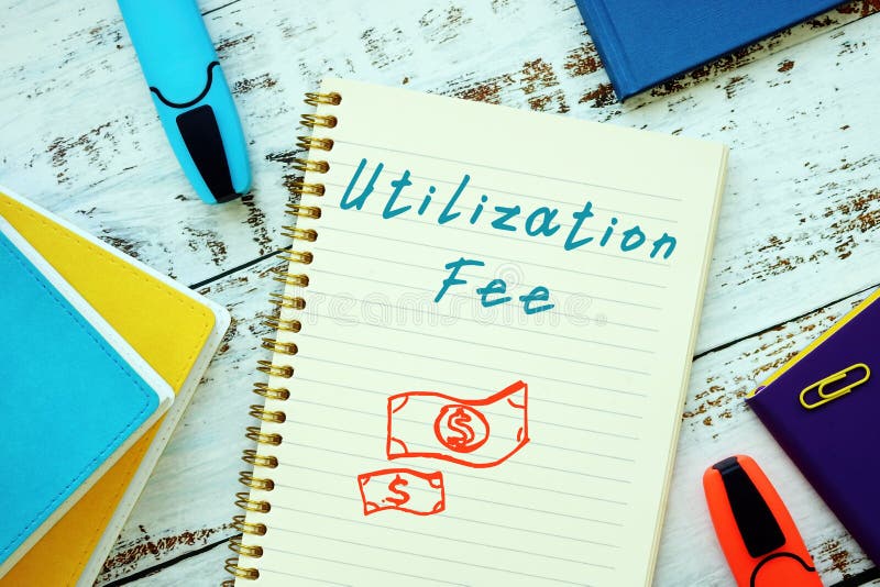 Financial Concept about Utilization Fee with Sign on the Sheet Stock ...