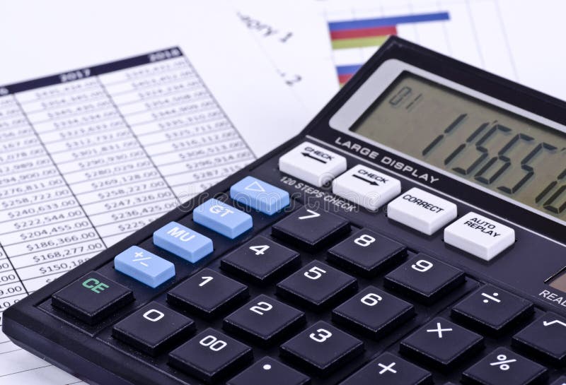 A Financial Credit Report with a Calculator Stock Photo - Image of ...