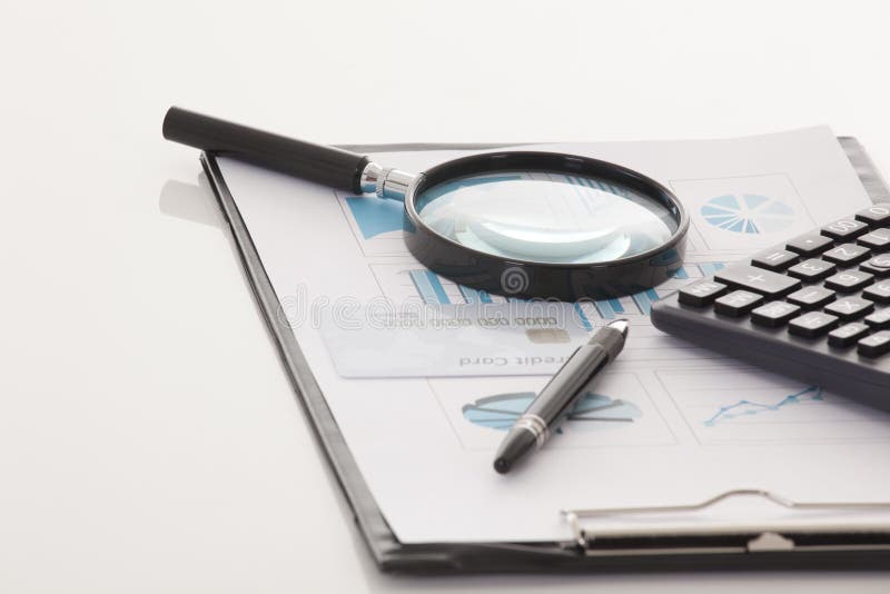 Magnifying Glass and Financial Documents. Audit and Accounting Stock ...