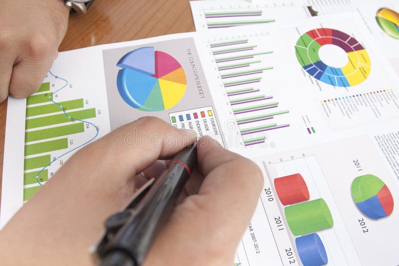 Financial data analyzing stock image. Image of annual - 34446381 Financial data analyzing stock image. Image of annual - 34446381