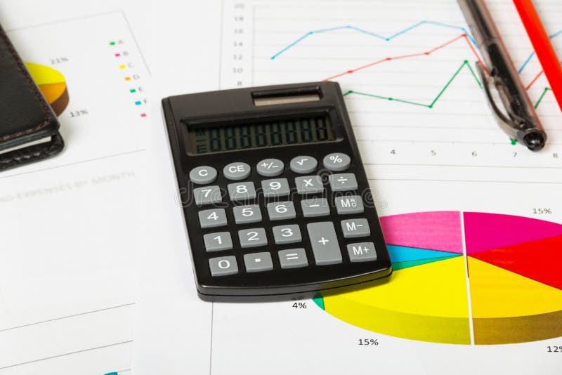 Financial Documents and Calculator on the Table Stock Image - Image of ...