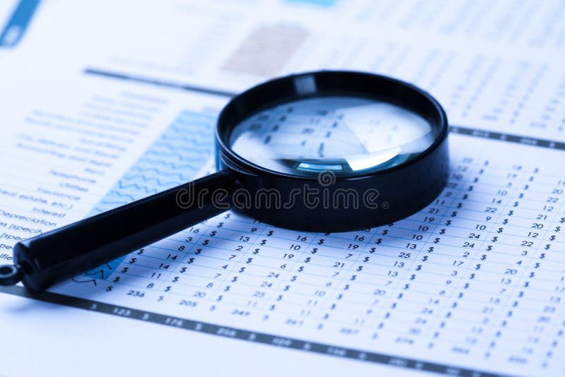 Financial Documents with Magnifying Glass Stock Photo - Image of ... Financial Documents with Magnifying Glass Stock Photo - Image of ...