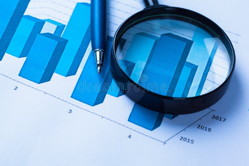 Financial Documents with Magnifying Glass Stock Photo - Image of ...