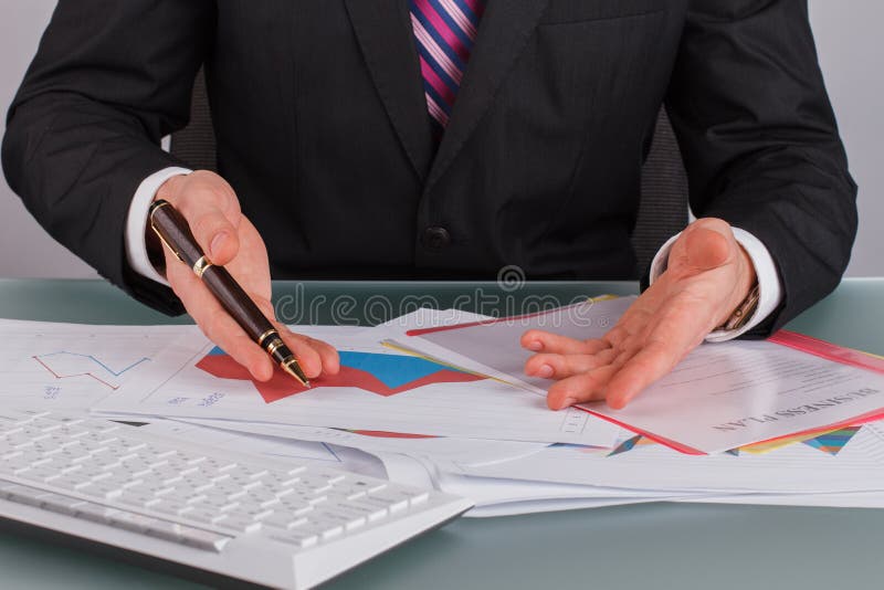 Financial Expert Analyzing Statistics Graphs Data. Stock Image - Image ...