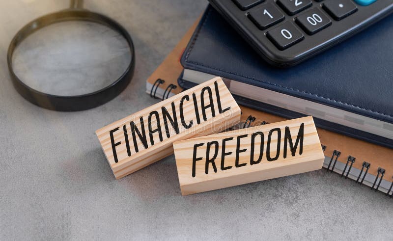 Financial Freedom Text Concept Written on Wooden Blocks Lying on a ...